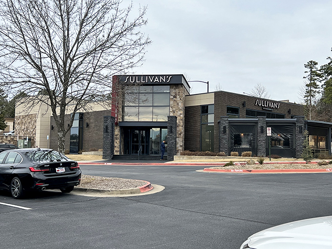 Stone and steel architecture promises the kind of meal that makes ordinary Tuesdays feel special.
