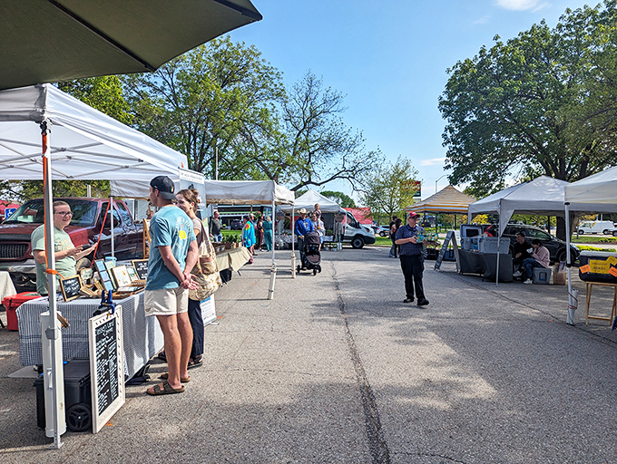 White tents line the street like a parade of possibilities for weekend treasure hunters.