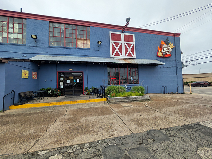 The bright blue exterior with barn-door styling tells you this place marches to its own delicious drumbeat.