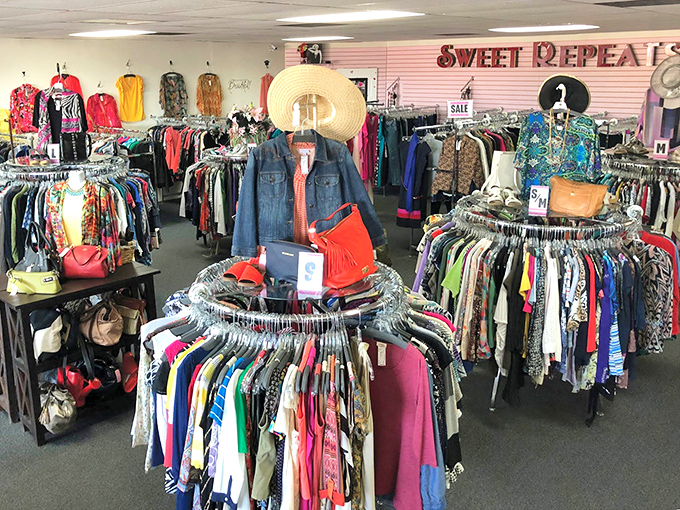 Sweet Repeats interior: "Circular racks of possibility! Every color of the rainbow awaits in this meticulously organized clothing paradise."