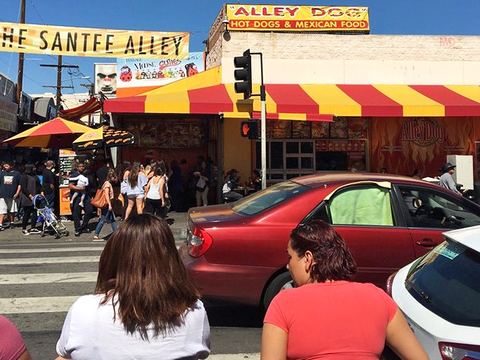 Street food at its finest, where bright awnings and bold flavors create the perfect downtown dining adventure.