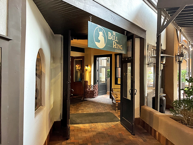 The Bull Ring's welcoming entrance at dusk promises the kind of steak dinner that makes downtown exploring totally worth it.