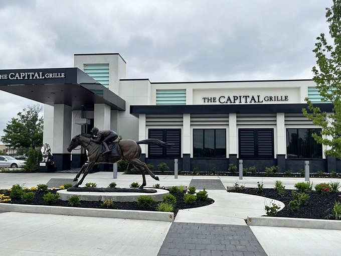 That racing horse statue isn't running away—it knows the best steaks in Louisville are right behind it!