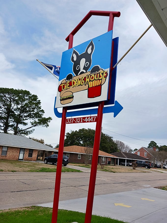 The cartoon dog on their sign practically winks at you, promising hot dog magic inside.