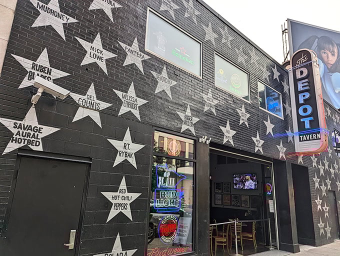 Music history meets culinary perfection. The Depot's iconic wall of stars hints at the star-quality dogs served within.