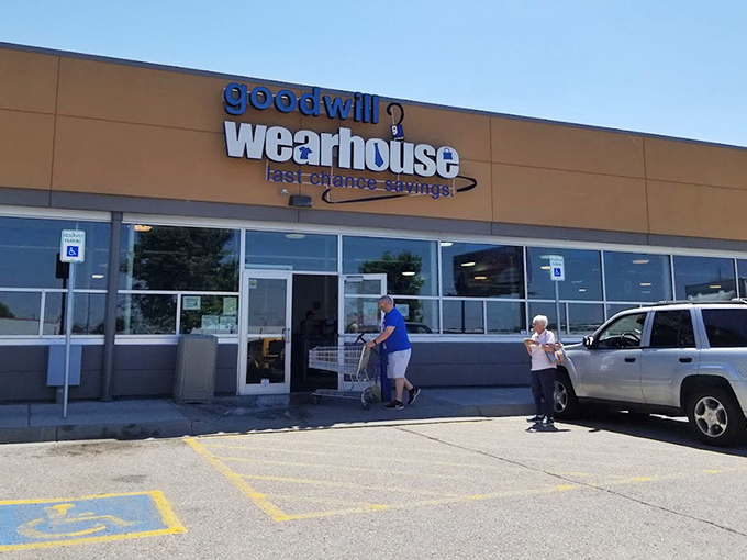Beyond these doors at the Goodwill Wearhouse lies a world of by-the-pound bargains for the brave.