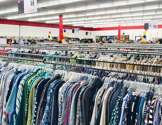 Rainbow racks of potential! The Salvation Army's organized clothing section stretches toward thrifting infinity.