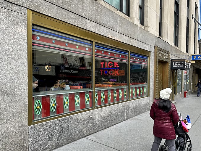 The colorful storefront windows showcase a diner that never sleeps, just like the city.
