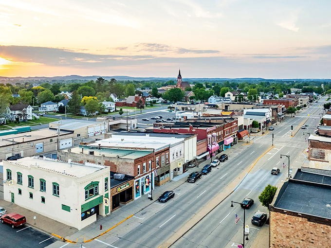 Sunset casts a golden glow over Tomah's Main Street, where small-town affordability meets big-hearted Wisconsin hospitality.