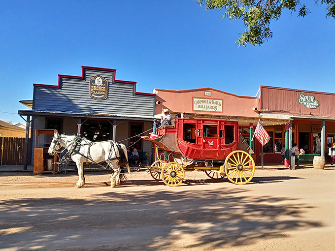 A stagecoach rolls through Tombstone, just like in the 1880s. The only thing missing is the dust and the desperados!
