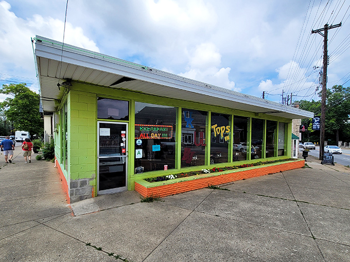 That bright green exterior practically shouts "fresh ingredients and creative breakfast magic happening inside here!"