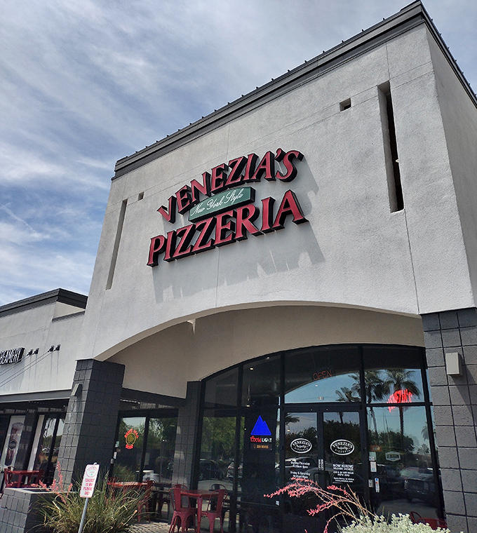 Clean lines and bright signage promise authentic pizzeria experiences worth the suburban drive.