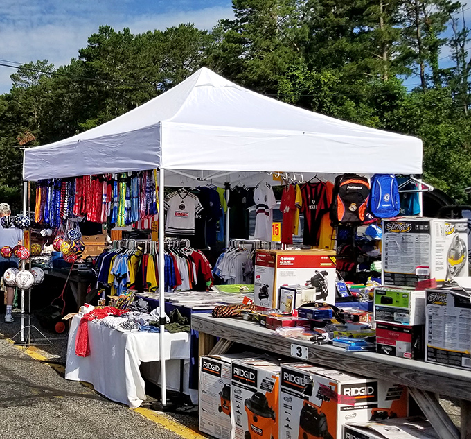 Every handyman's dream come true - where function meets affordability under white canvas tents.