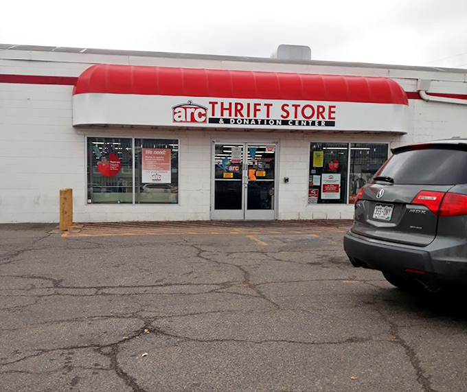 The red awning signals "stop and shop" more effectively than any traffic light on Broadway.