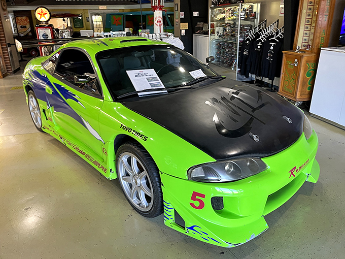 The neon green 1995 Mitsubishi Eclipse from "Fast and Furious" practically vibrates with energy. Danger and speed in automotive form.