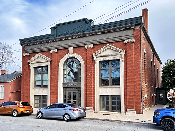 This isn't just another pretty brick building—it's 420 West, where architectural details from another century remind us when craftsmanship wasn't optional.