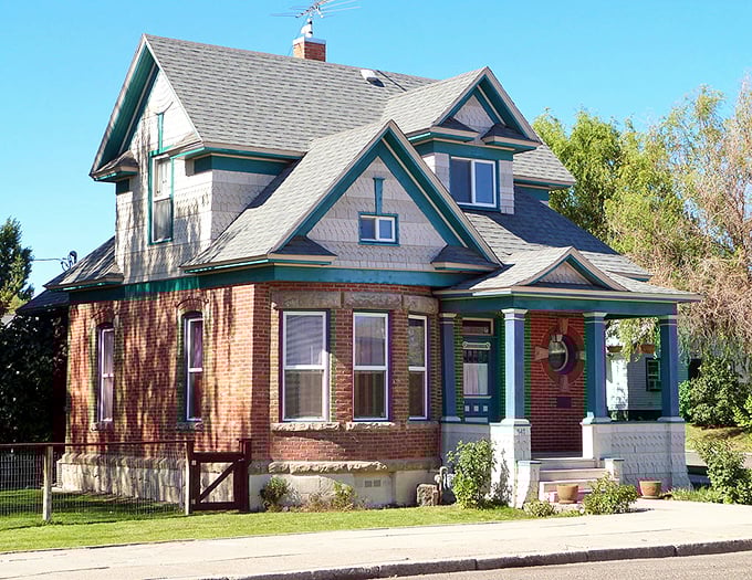 Victorian charm meets practical porch sitting in this historic home. The architects clearly understood the importance of quality rocking chair space.