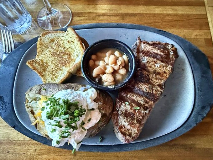 Simple perfection on a plate: a perfectly grilled Angus sirloin, garlic toast that means business, and sides that know their supporting role in this meaty drama.
