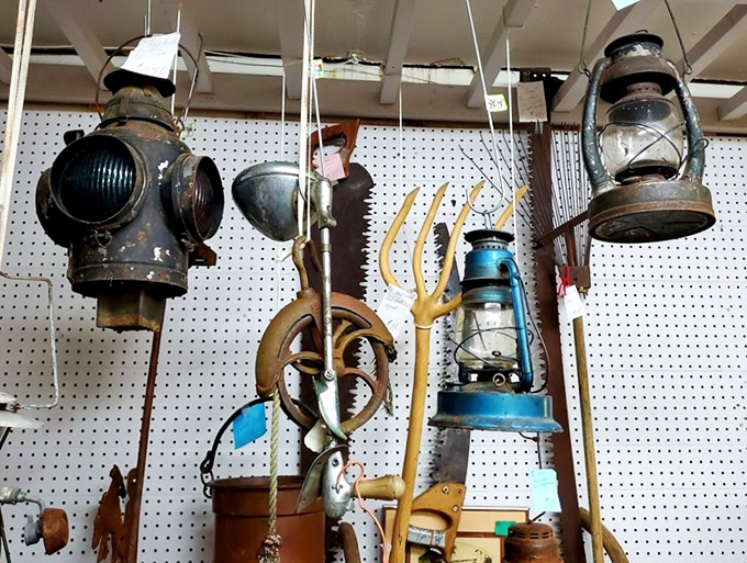Old lanterns and tools that once lit pathways and built homes now illuminate our connection to simpler, sturdier times.