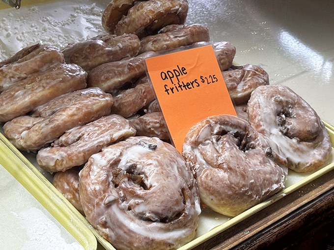 Apple fritters that could make an orchard blush with pride. That glaze isn't just a topping &ndash; it's nature's way of saying "good morning!"