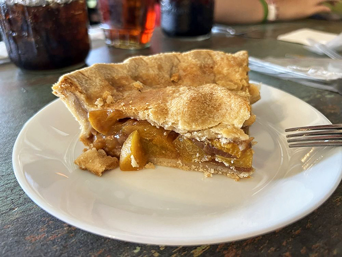 Apple pie that doesn't just suggest homemade but screams it from the rooftops, with perfectly flaky crust and cinnamon-kissed filling that tastes like childhood memories.
