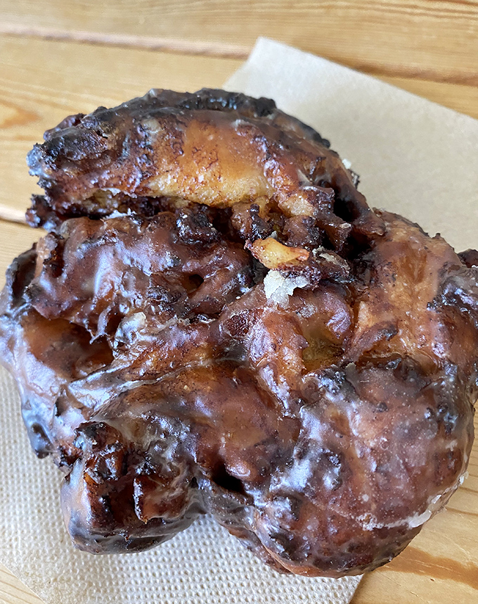 Not all heroes wear capes &ndash; some, like this apple fritter, wear a glorious glaze and hide chunks of cinnamon-kissed fruit within their craggy landscape.
