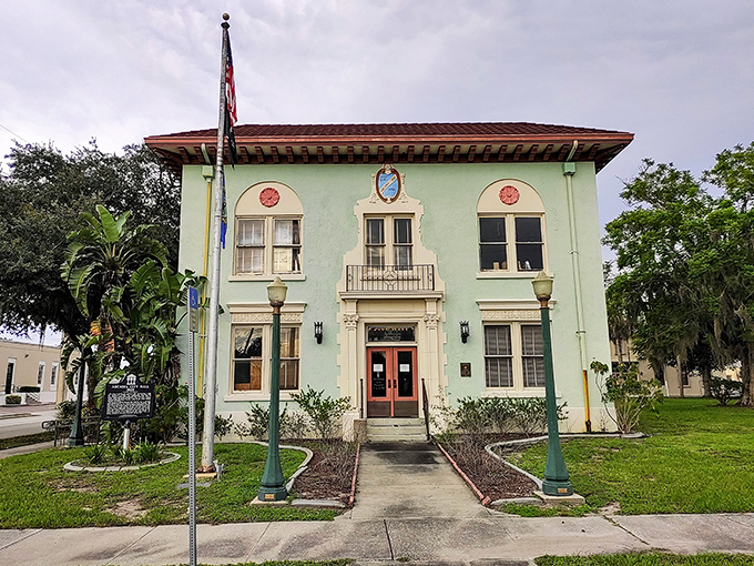 Arcadia's City Hall stands as a mint-green testament to Florida's architectural heritage—like a wedding cake that survived the humidity.