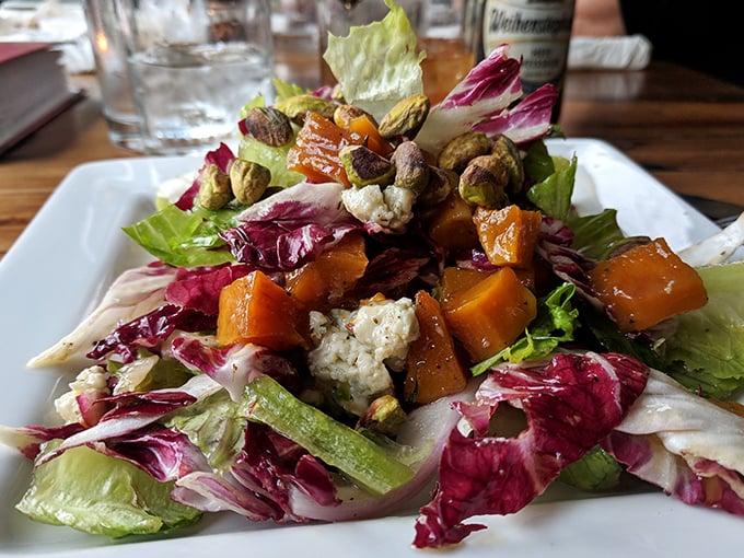 Whoever said "you don't make friends with salad" never met this gorgeous arrangement of greens, nuts, and roasted vegetables that's practically showing off.