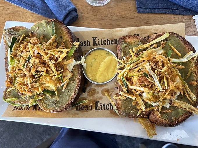 Avocado toast that puts mortgage-delaying millennial jokes to shame. Those crispy shoestring potatoes add the textural contrast that dreams are made of.