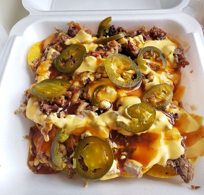 BBQ nachos: where Memphis smoke meets Tex-Mex crunch. Those jalape&ntilde;os aren't just garnish&mdash;they're exclamation points.