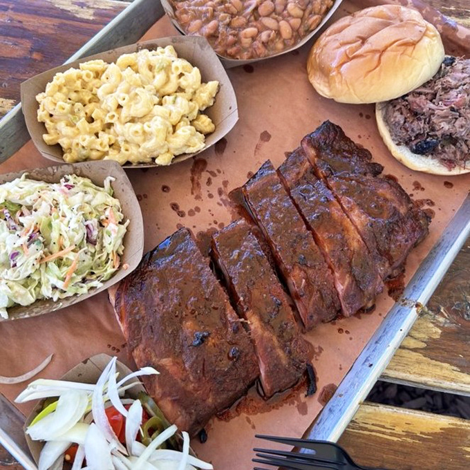 A barbecue spread that would make a vegetarian question their life choices – mac and cheese that's practically glowing with cheesy goodness.