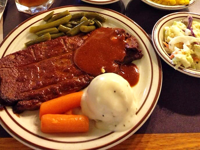 BBQ steak with that perfect smoke ring, where each slice tells the story of patience, tradition, and wood-fired mastery.