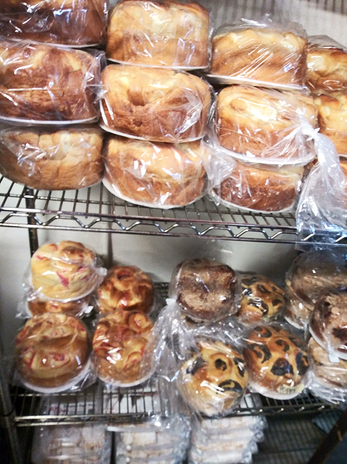 These golden-domed Polish pastries wait patiently behind plastic, like treasure chests of sweetness ready to transport you across the Atlantic.