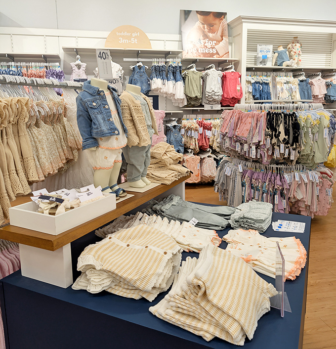 Tiny clothes for tiny humans, arranged with such precision you'll forget the chaos these adorable outfits will eventually endure.