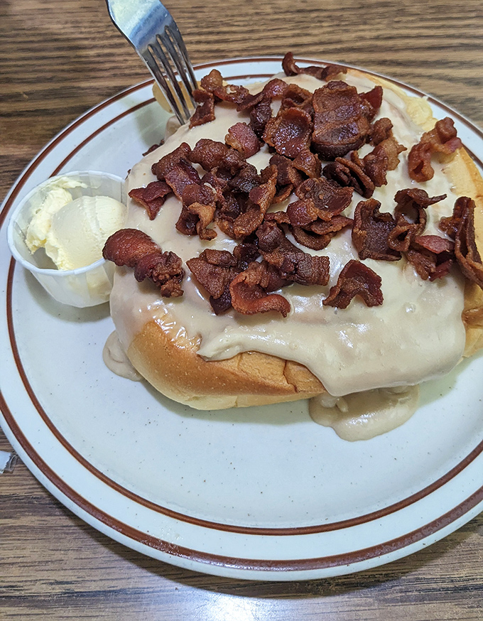 Bacon atop a cinnamon roll? It's like breakfast decided to throw caution to the wind and live its best life.
