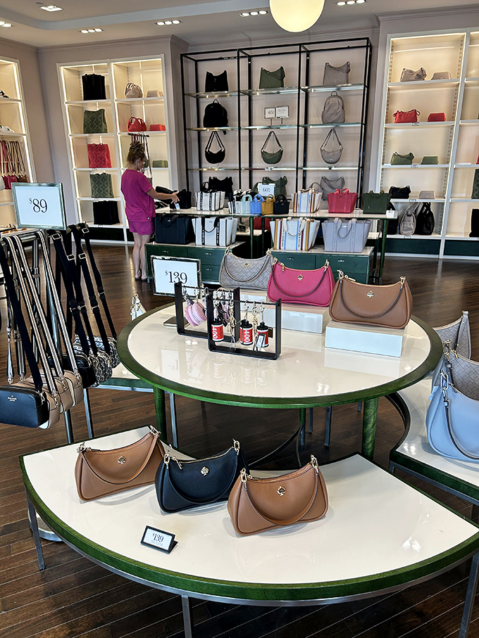 Handbag nirvana! Coach's elegant display transforms everyday accessories into objects of desire, arranged like fine art in a museum of retail.