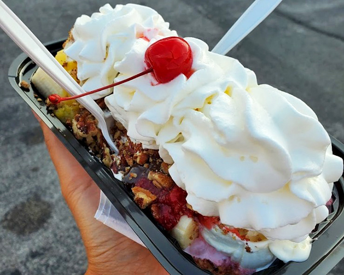 Whipped cream mountains, cherry-topped peaks, and a foundation of frozen custard&mdash;this banana split isn't dessert, it's architecture you can eat.