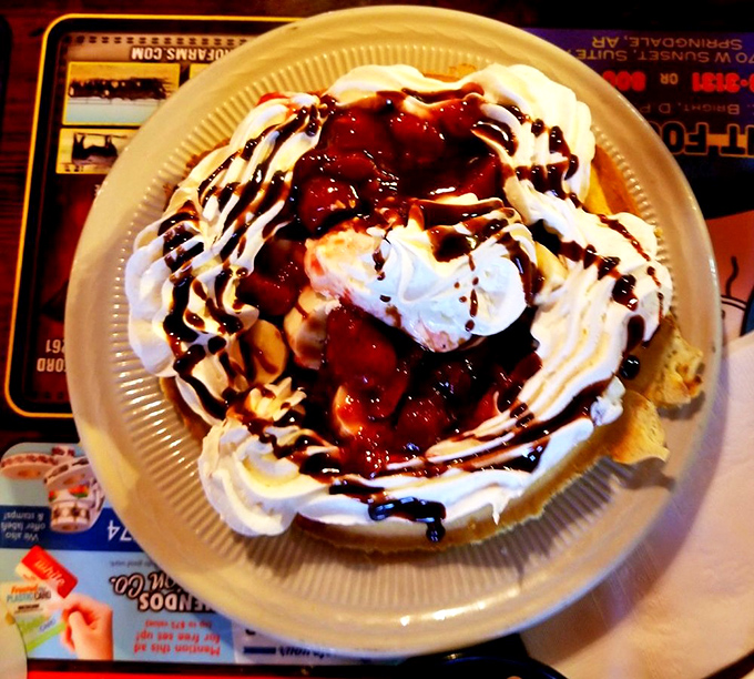 This isn't just dessert&mdash;it's an architectural marvel of whipped cream, chocolate, and cherries that makes you question why we don't eat dessert for breakfast.