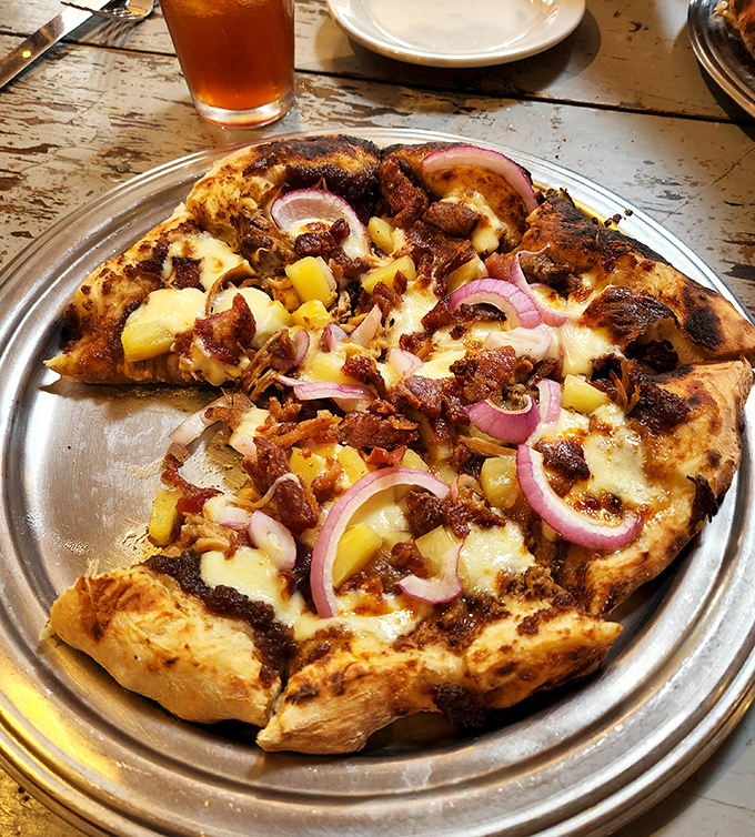 This isn't just pizza&mdash;it's a circular argument for why Hawaiian toppings belong, with caramelized pineapple and red onions making the case deliciously.