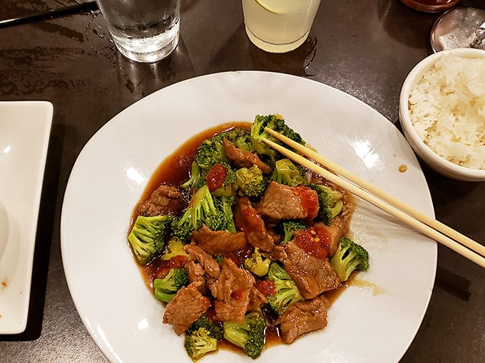 Beef and broccoli done right, with tender meat and vegetables that haven't been cooked into submission by an angry wok.
