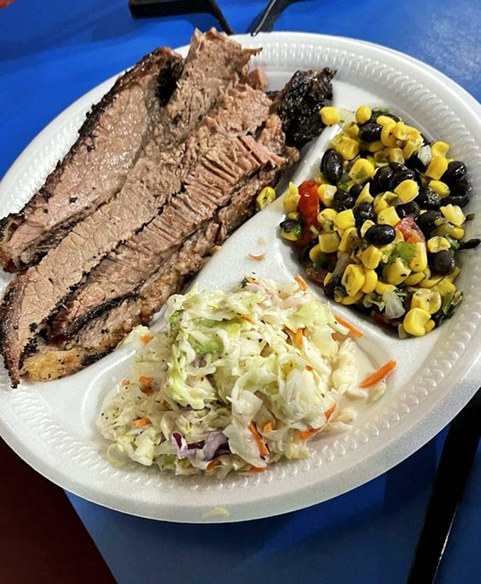 Brisket sliced thin with that telltale pink smoke ring&mdash;the barbecue equivalent of finding the Hope Diamond in your backyard.
