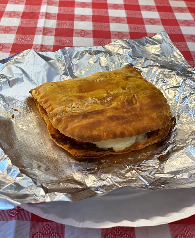 Golden, flaky, and stuffed with cheesy goodness &ndash; this calzone doesn't need a passport to transport you straight to Southern Italy.