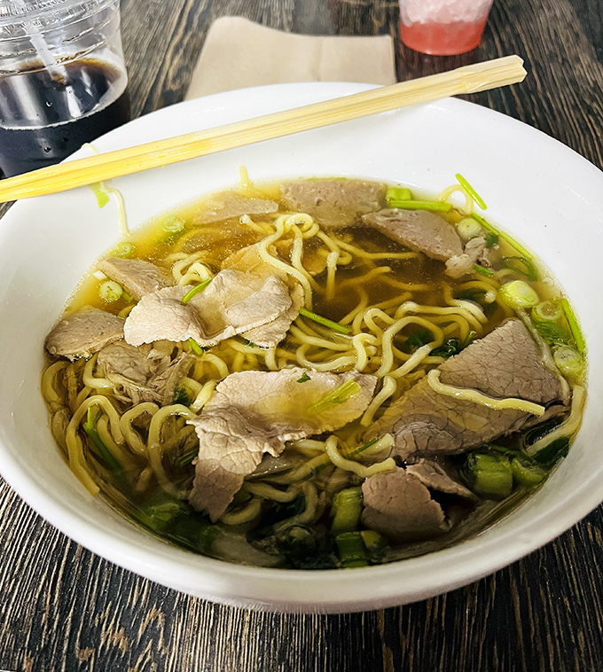 Simplicity at its finest&mdash;thin noodles swimming in a golden broth with perfectly sliced beef. Green onions add a fresh pop to this traditional comfort bowl.