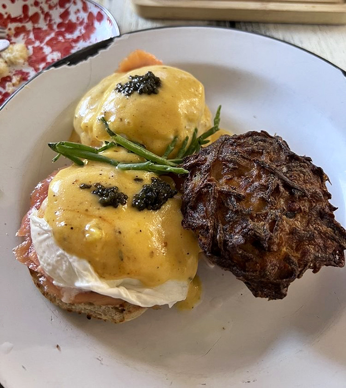 Beef tenderloin Benedict topped with what appears to be caviar, because apparently we're doing brunch like royalty now.