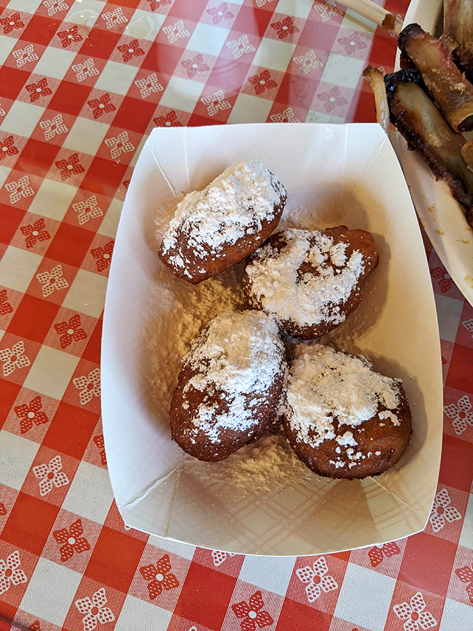 Sweet, powdered treasures that prove dessert after barbecue isn't just an option &ndash; it's practically a constitutional right.