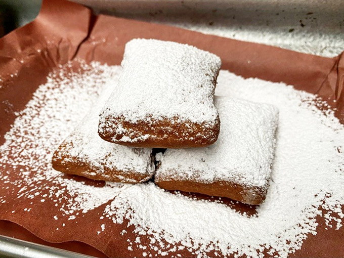 Those pillowy beignets dusted with powdered sugar prove Louisiana knows exactly how to sweeten any meal's grand finale.