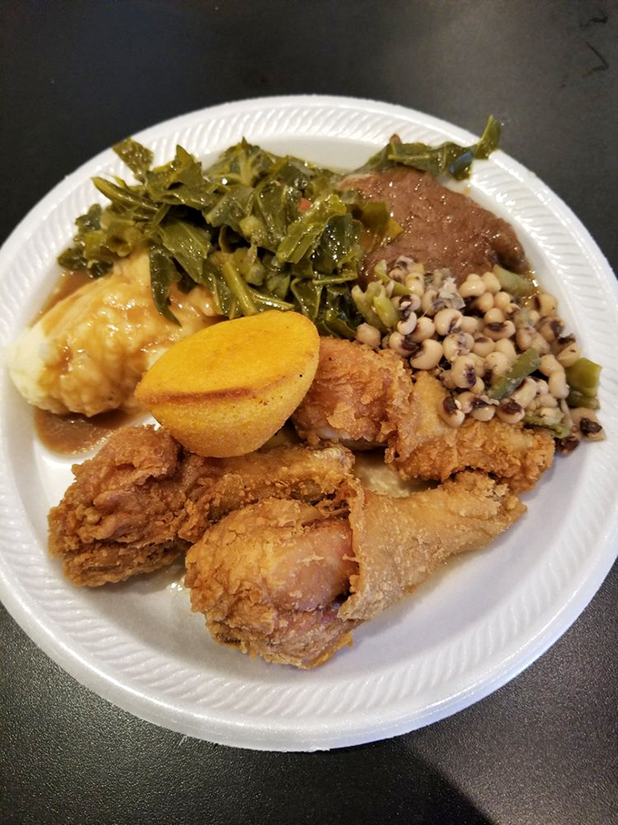 A plate that tells Alabama's culinary story&mdash;fried chicken, black-eyed peas, and collard greens forming the holy trinity of Southern comfort.