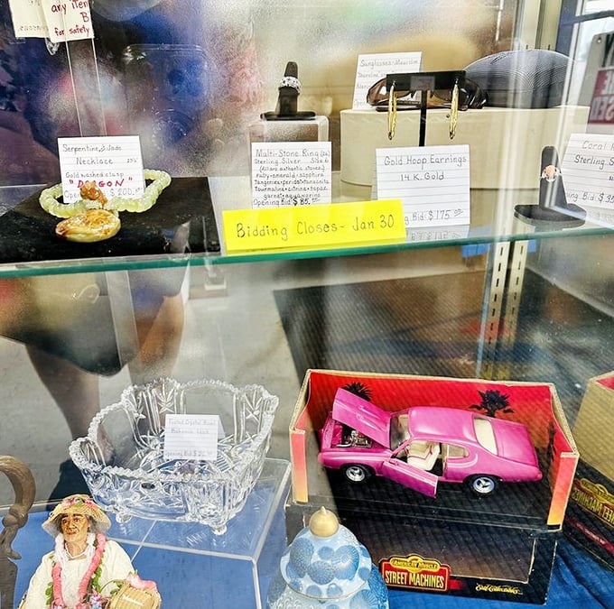 The jewelry case: where treasure hunting gets serious. That pink Cadillac might be a toy, but those 14K gold earrings above it are the real deal.