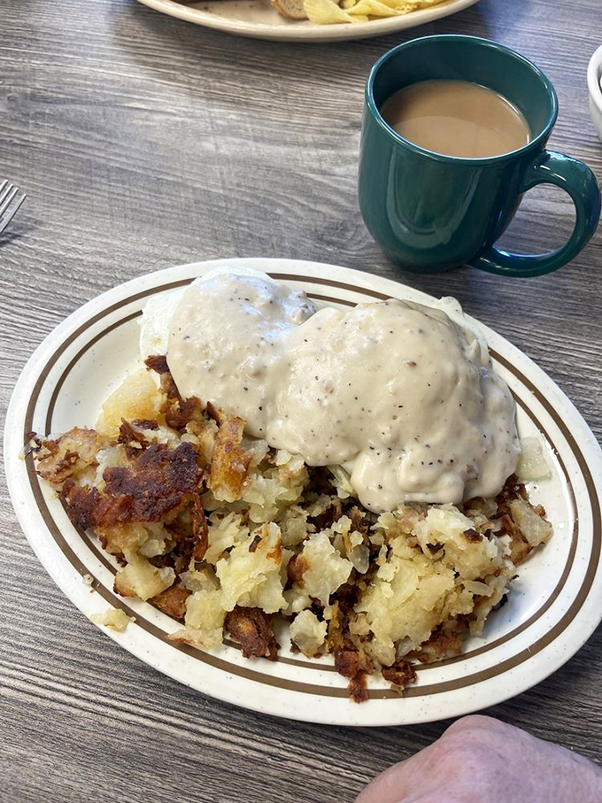 Biscuits swimming in gravy, the kind of meal that makes cardiologists nervous but souls happy.