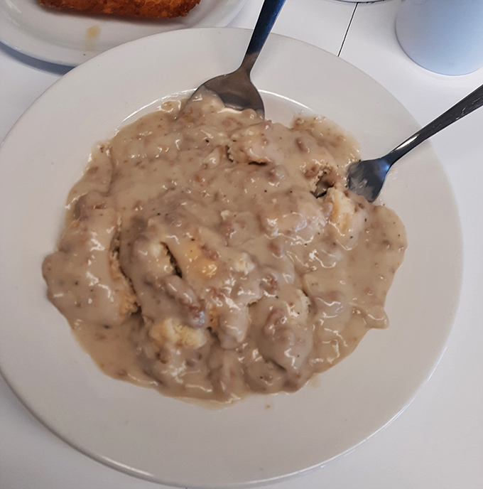 Biscuits and gravy: the comfort food equivalent of a warm hug from someone who truly understands what makes mornings worthwhile.